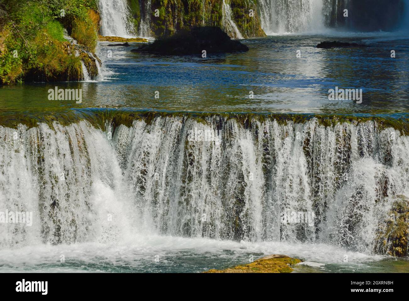 waterfall on wild river with fresh drinking water in summer Stock Photo ...