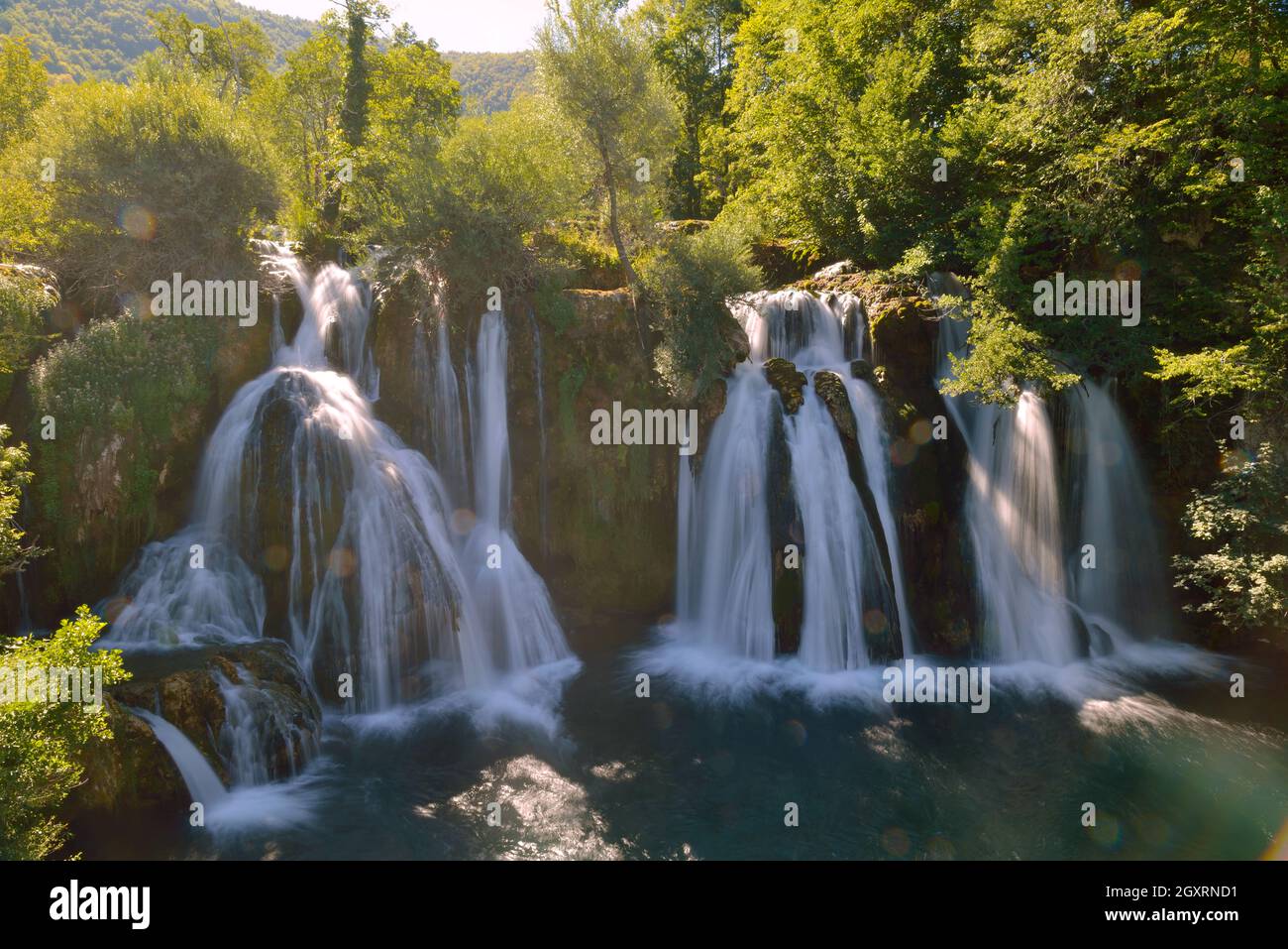 waterfall on wild river with fresh drinking water in summer Stock Photo ...