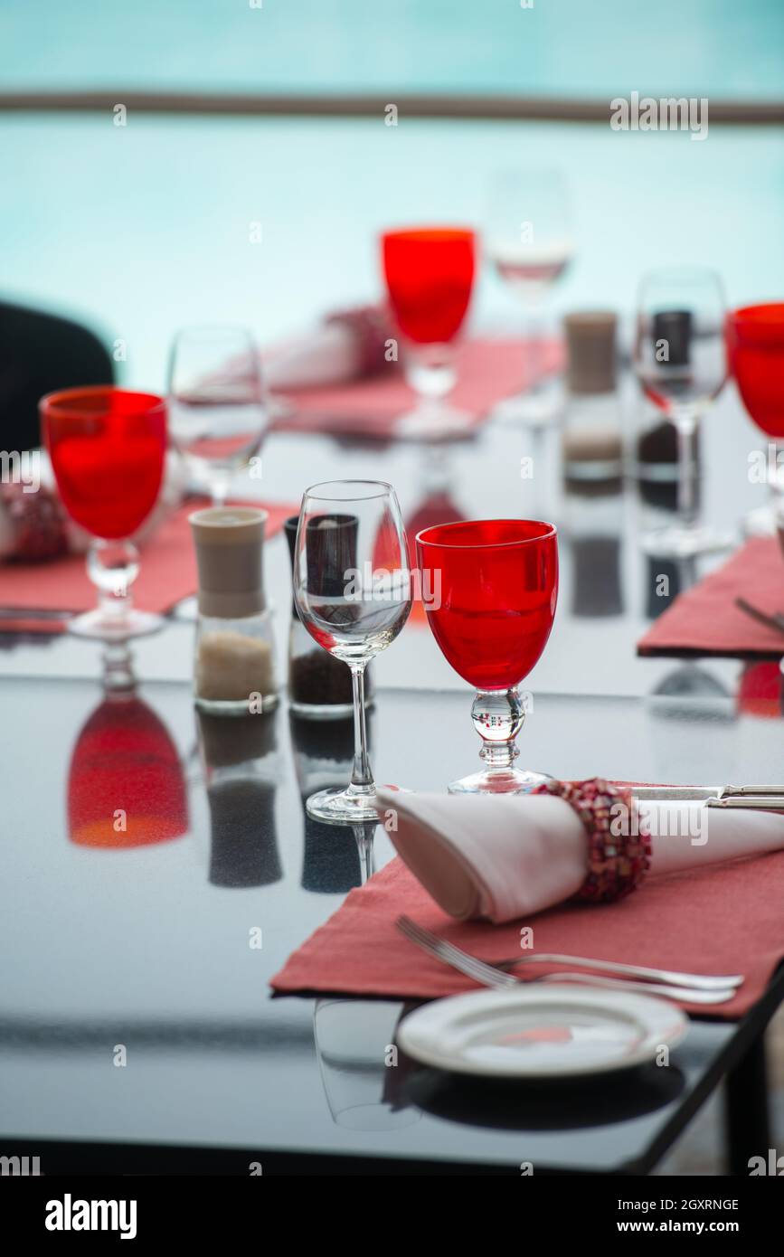 table setting at modern tropical restaurant Stock Photo - Alamy