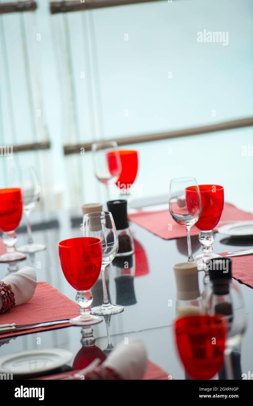 table setting at modern tropical restaurant Stock Photo - Alamy