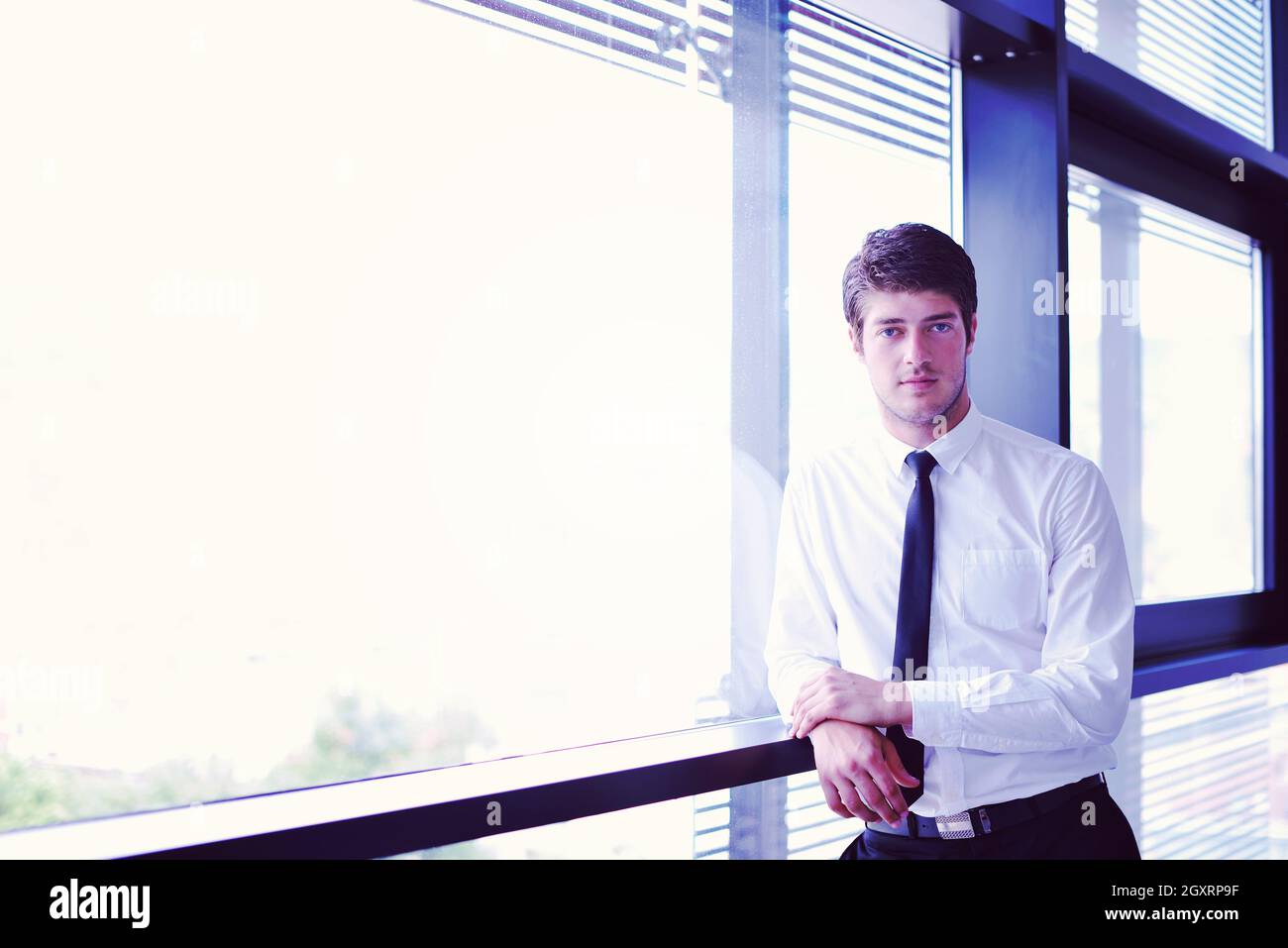 happy young business man work in modern office on computer Stock Photo ...