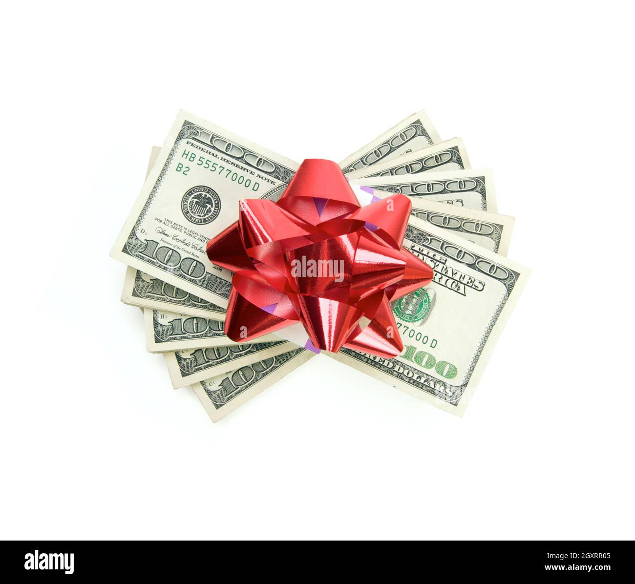 Stack of Money with Bow Isolated on a White Background Stock Photo - Alamy
