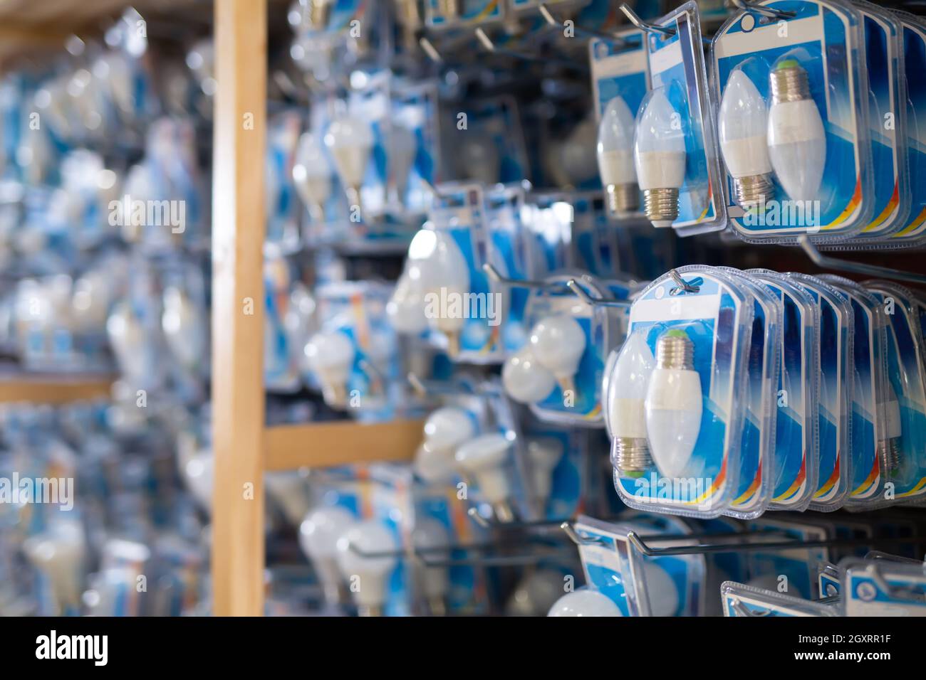 Light bulbs on display stand in household goods store Stock Photo - Alamy