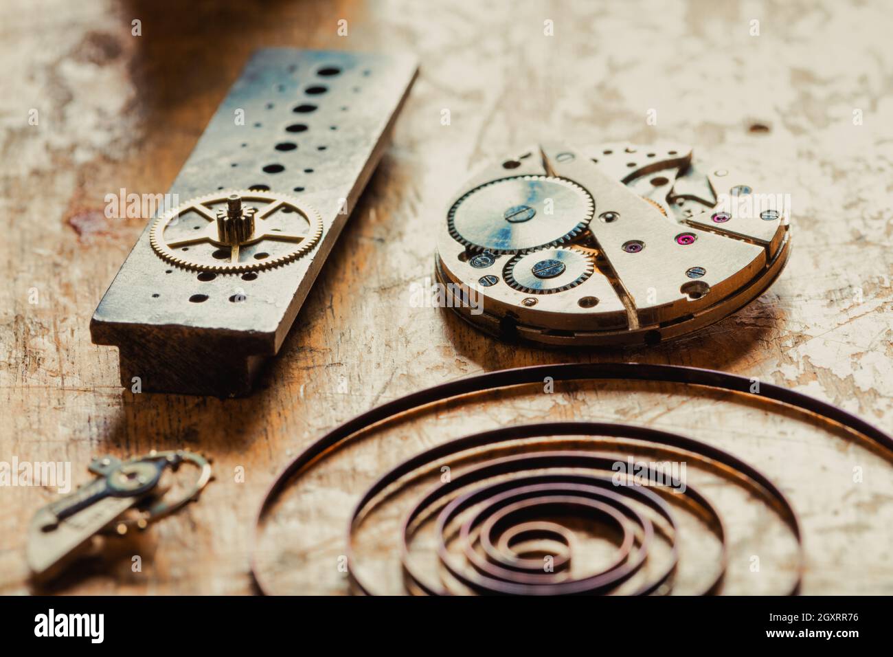 selective focus on Detail of a clockmakers workbench with old watch ...