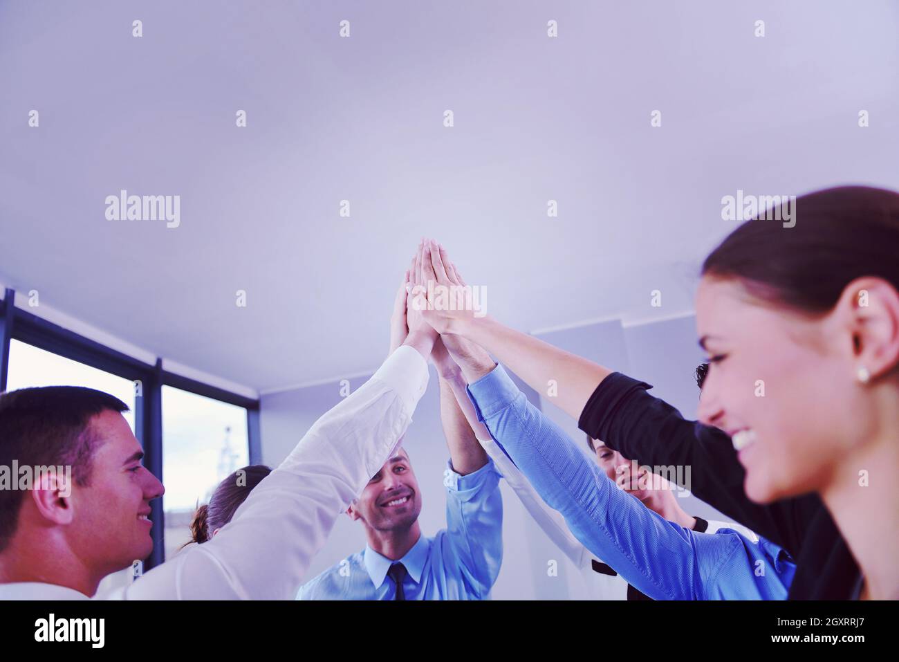 business people group joining hands and representing concept of ...