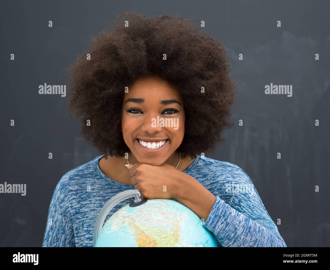 portrait of a beautiful friendly African American woman with a curly ...