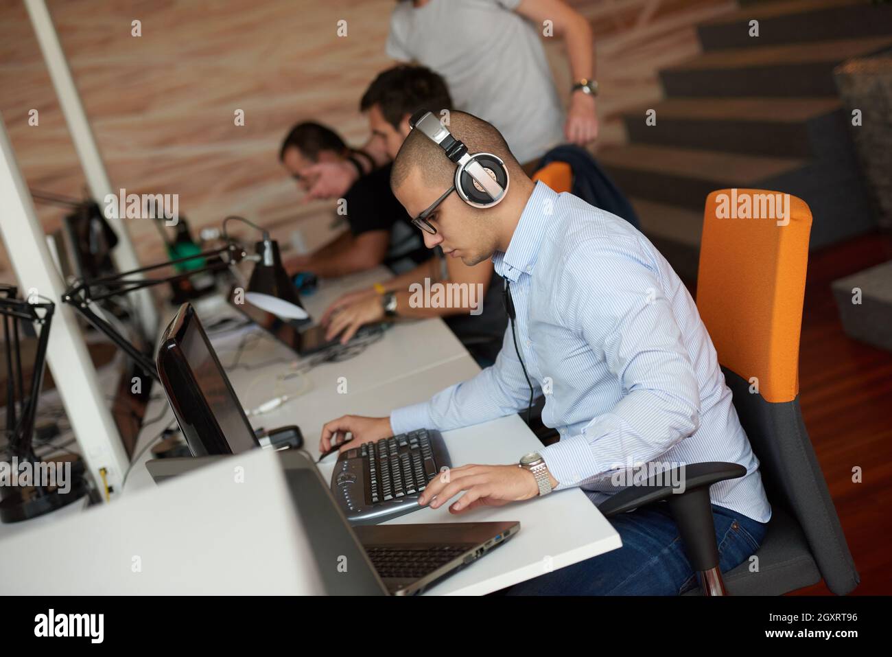 startup business, software developer working on computer at modern ...