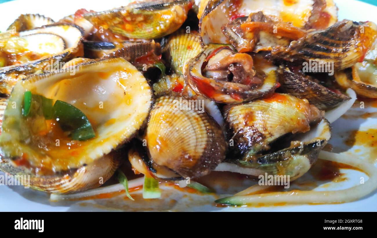 shell cook with chilli sauce Stock Photo - Alamy