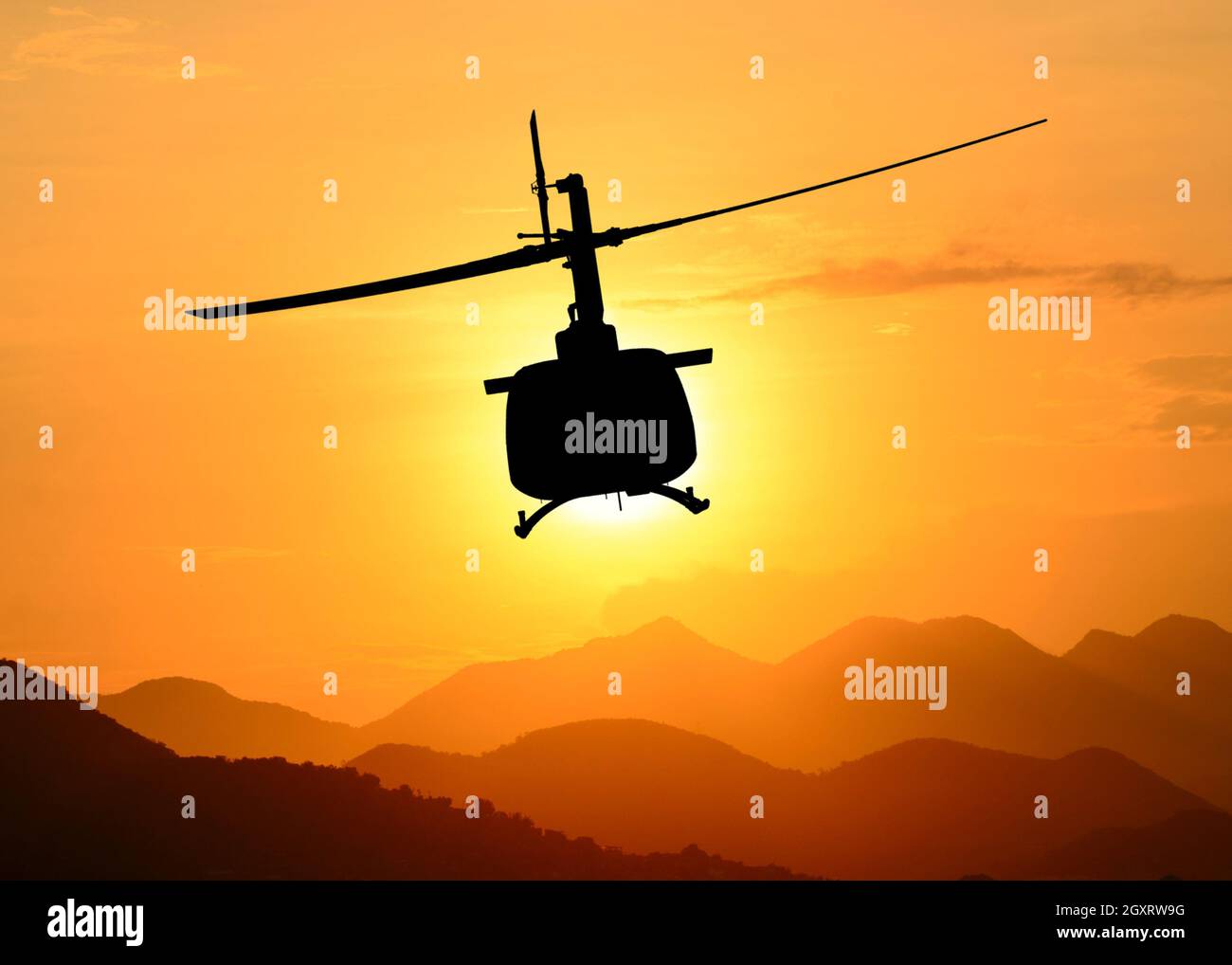 American utility military helicopter in the flight Stock Photo - Alamy