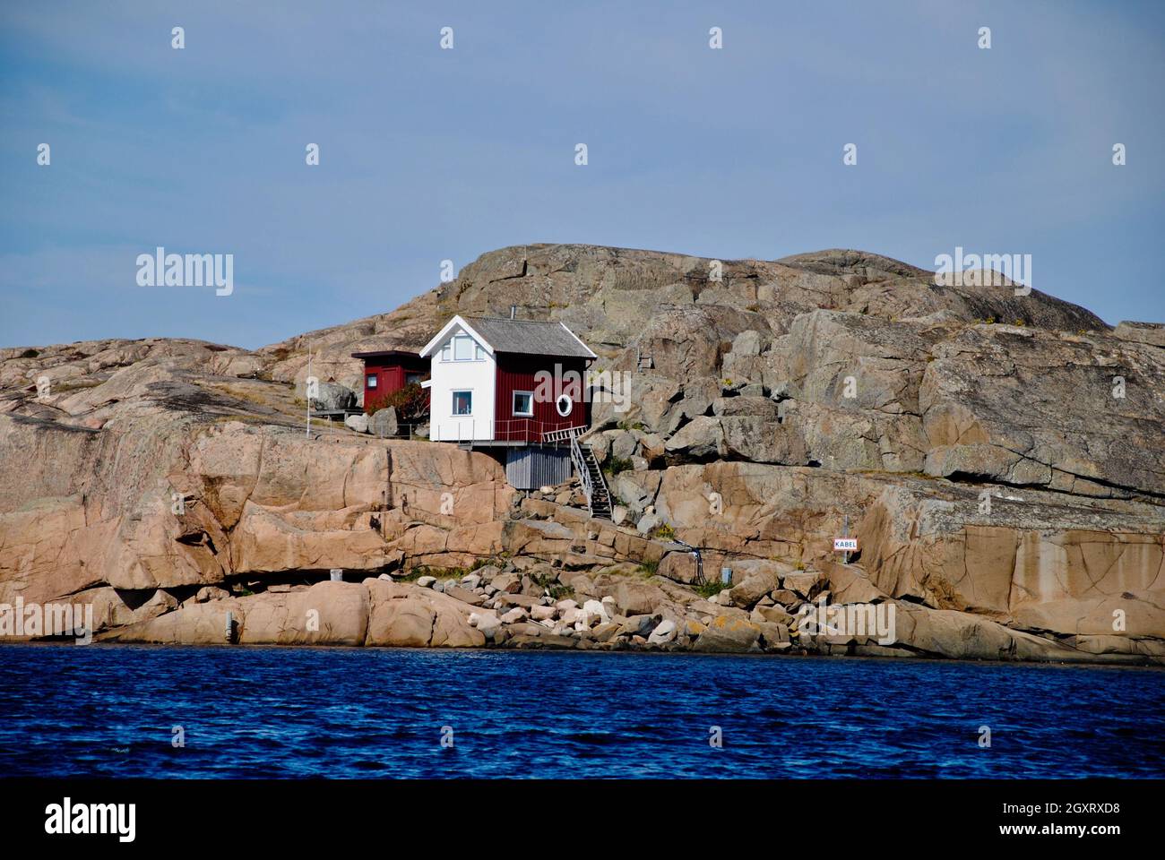 Lonely cottage on rocky island in Fjällbacka archipelago on the western ...