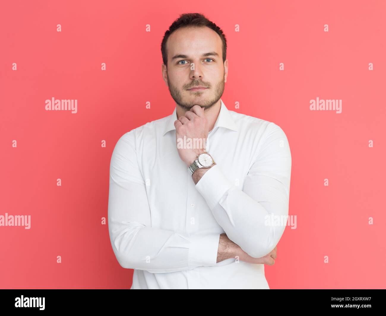 portrait of a handsome young man isolated over a red background Stock ...