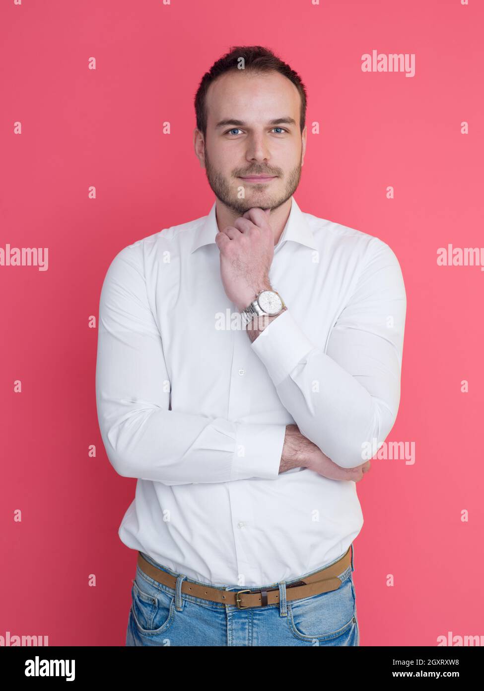 portrait of a handsome young man isolated over a red background Stock ...