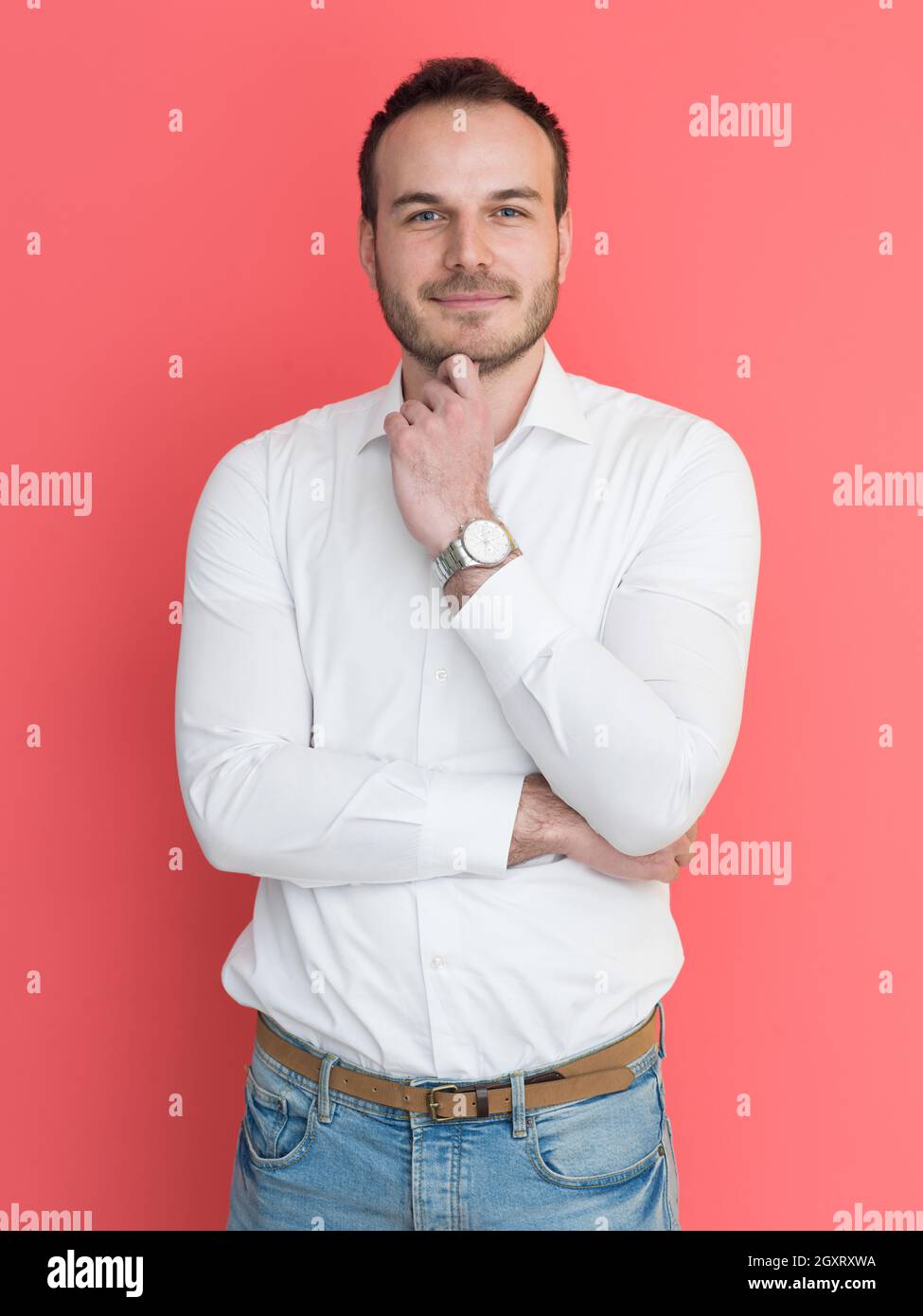 portrait of a handsome young man isolated over a red background Stock ...