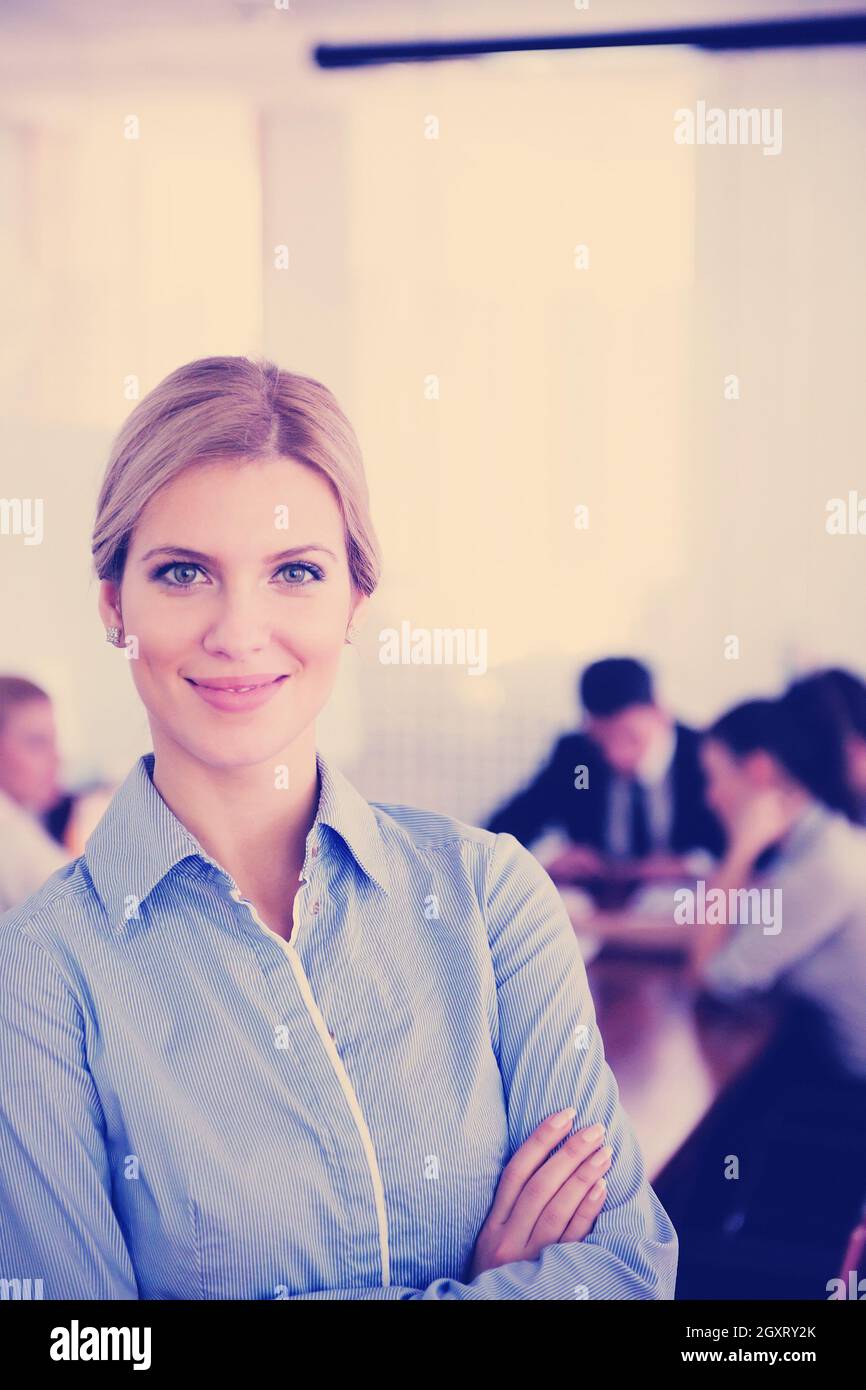 business woman with her staff, people group in background at modern ...