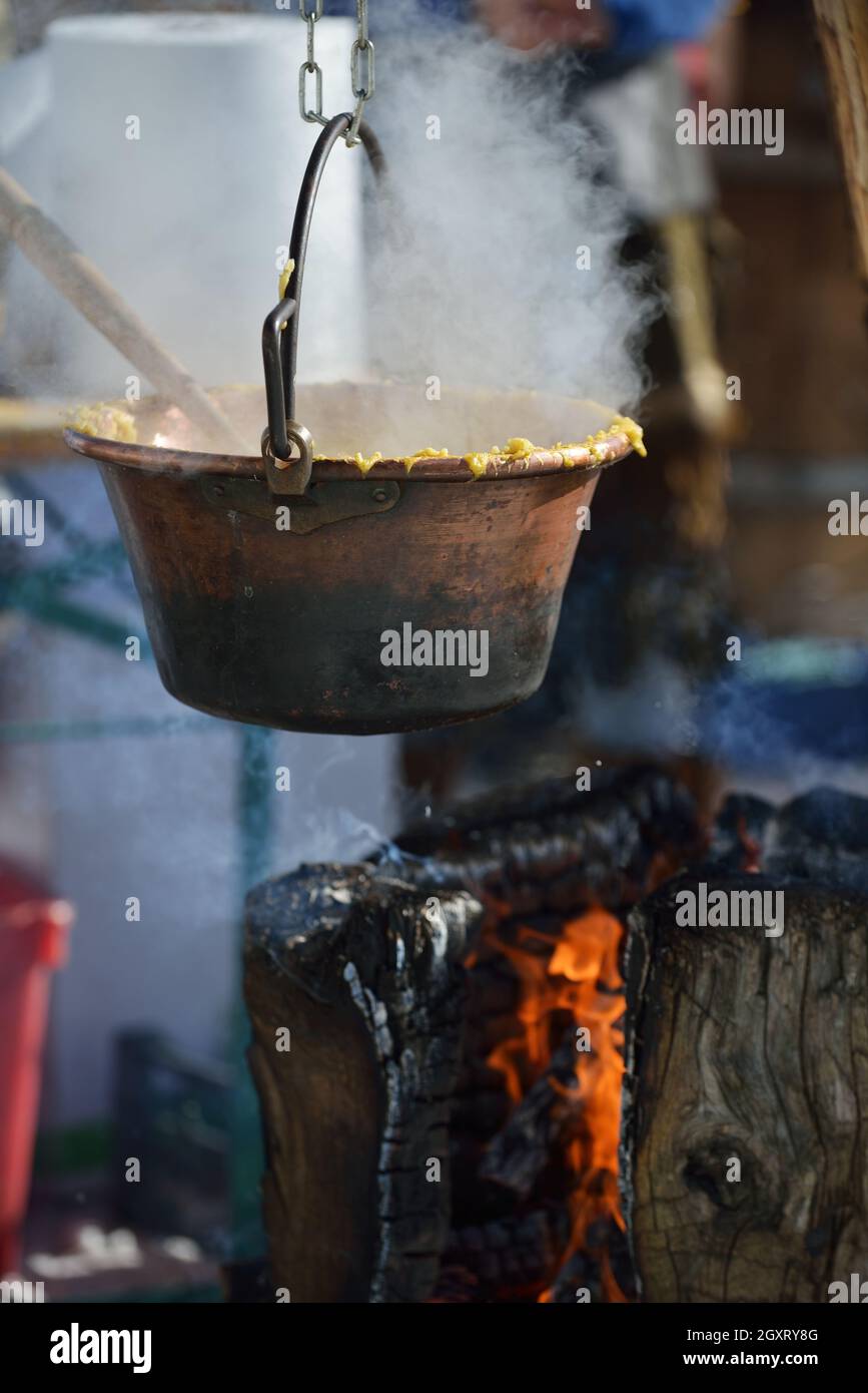 polenta food prepared on traditional recipe with fire and woods on ...