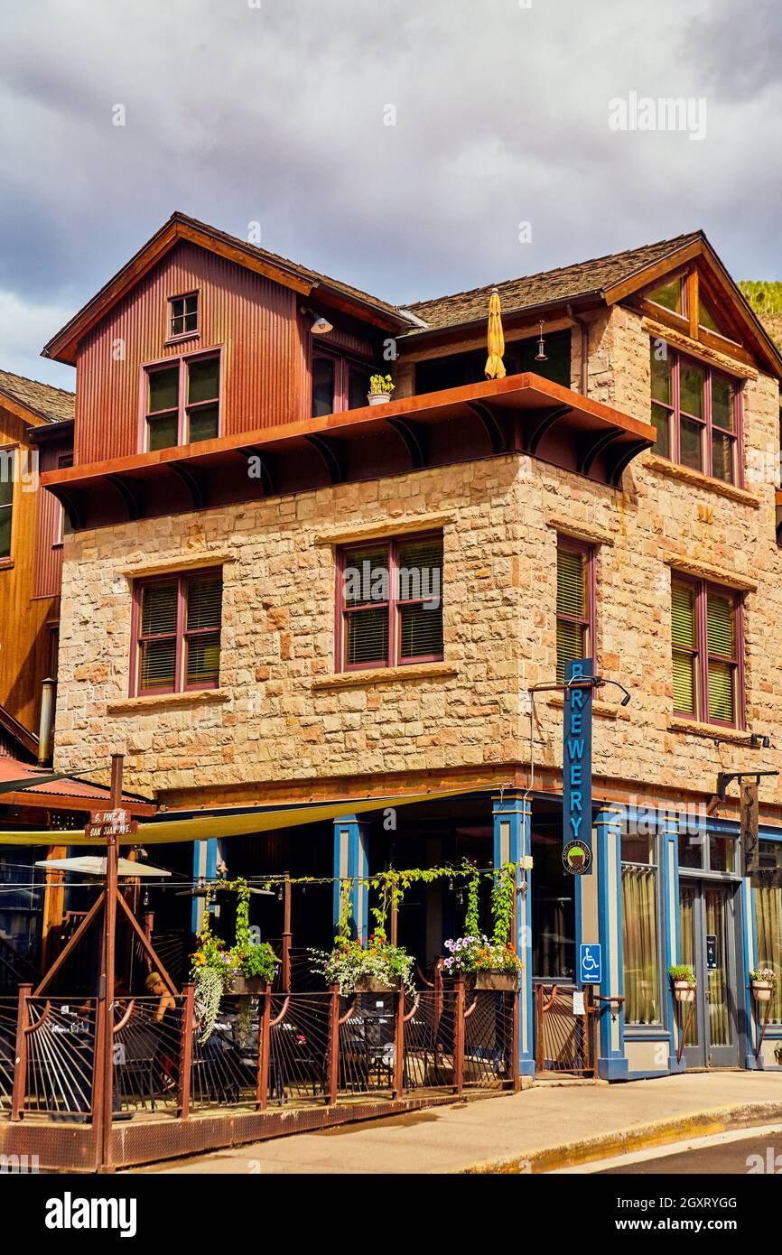 Brewery generic building vertical with outdoor patio and stone walls ...