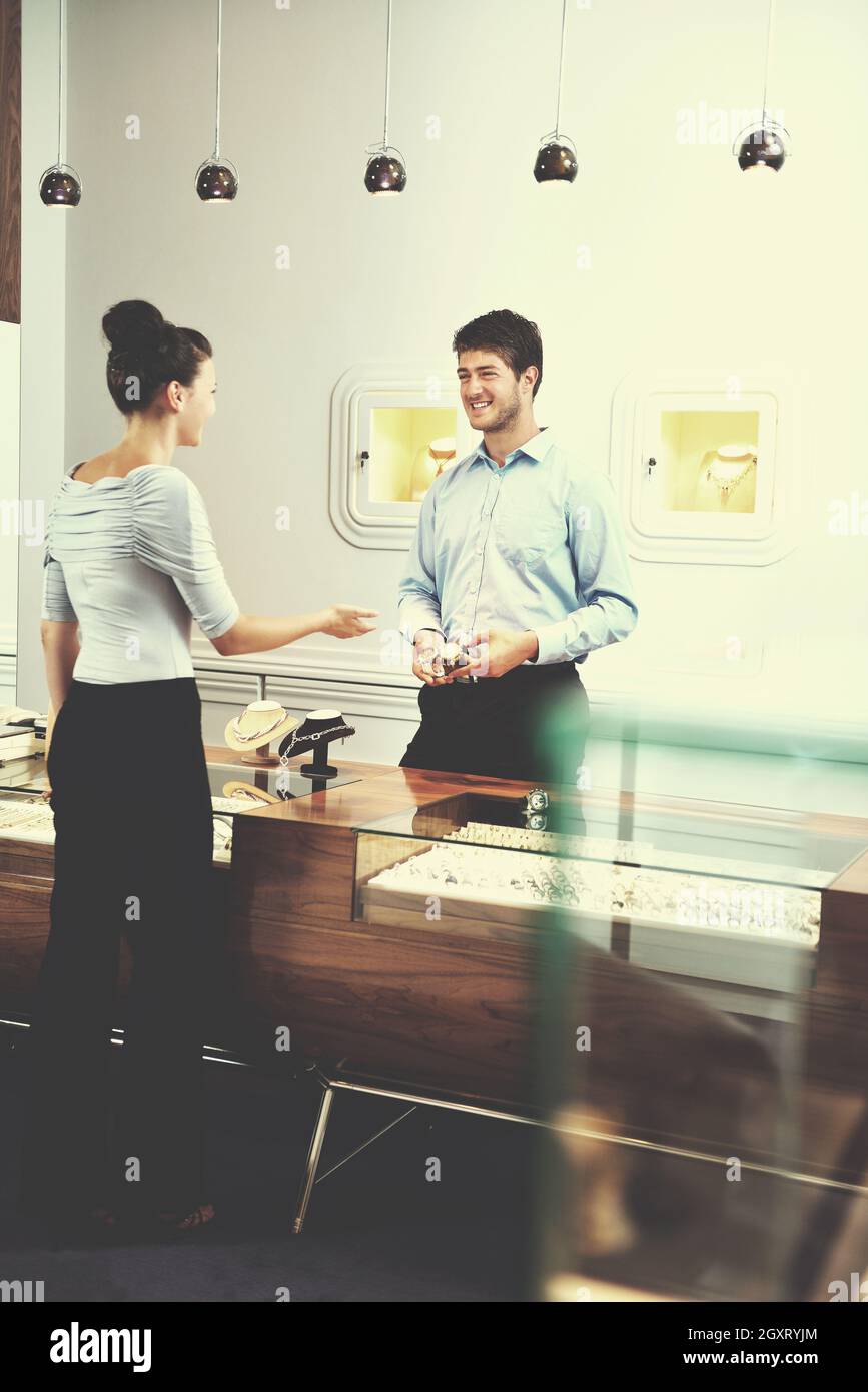 business man selling in jewelry store Stock Photo - Alamy