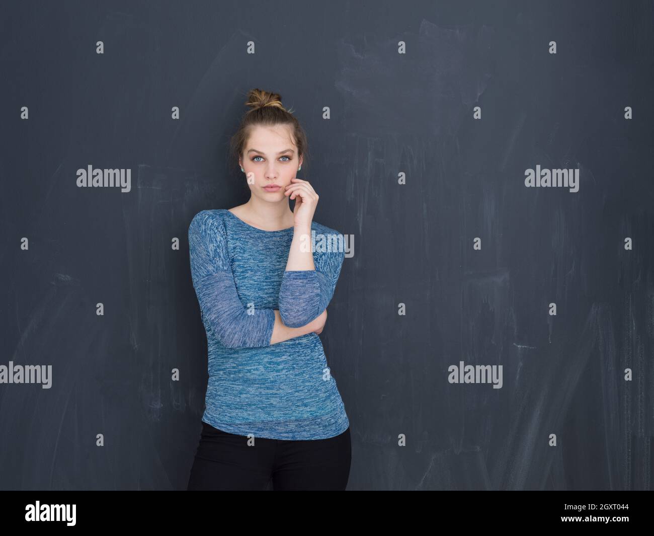 portrait of Beautiful young woman isolated on grey background Stock ...