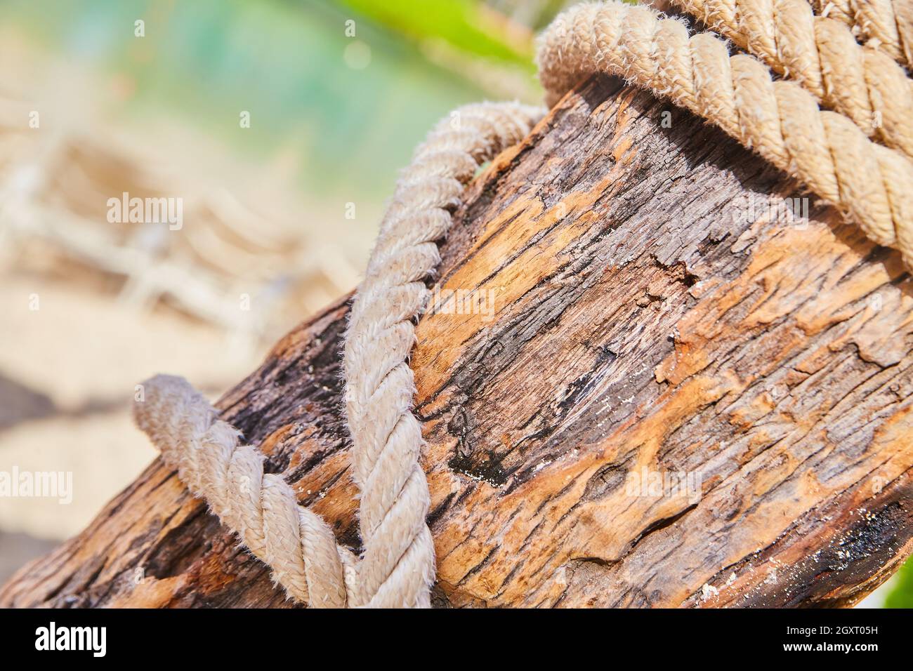 Detail of sailors rope wrapping around wood beam in tropics Stock Photo ...