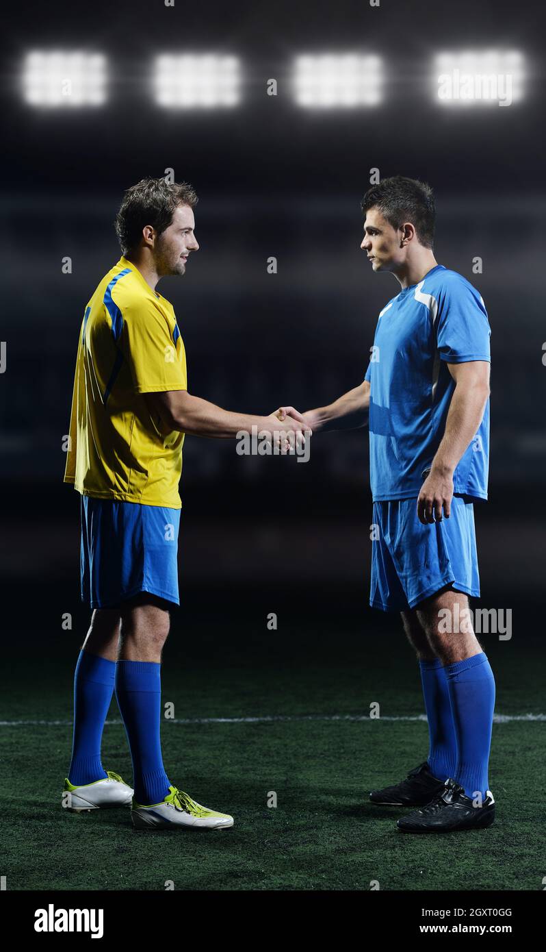 soccer player handshake on a football stadium before the game Stock ...