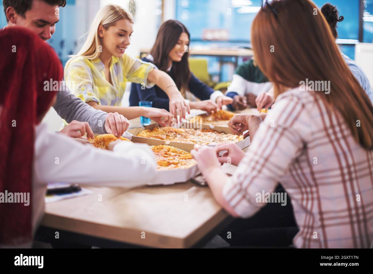 Friendly Diverse Multiethnic Business Team Eating Sharing Pizza