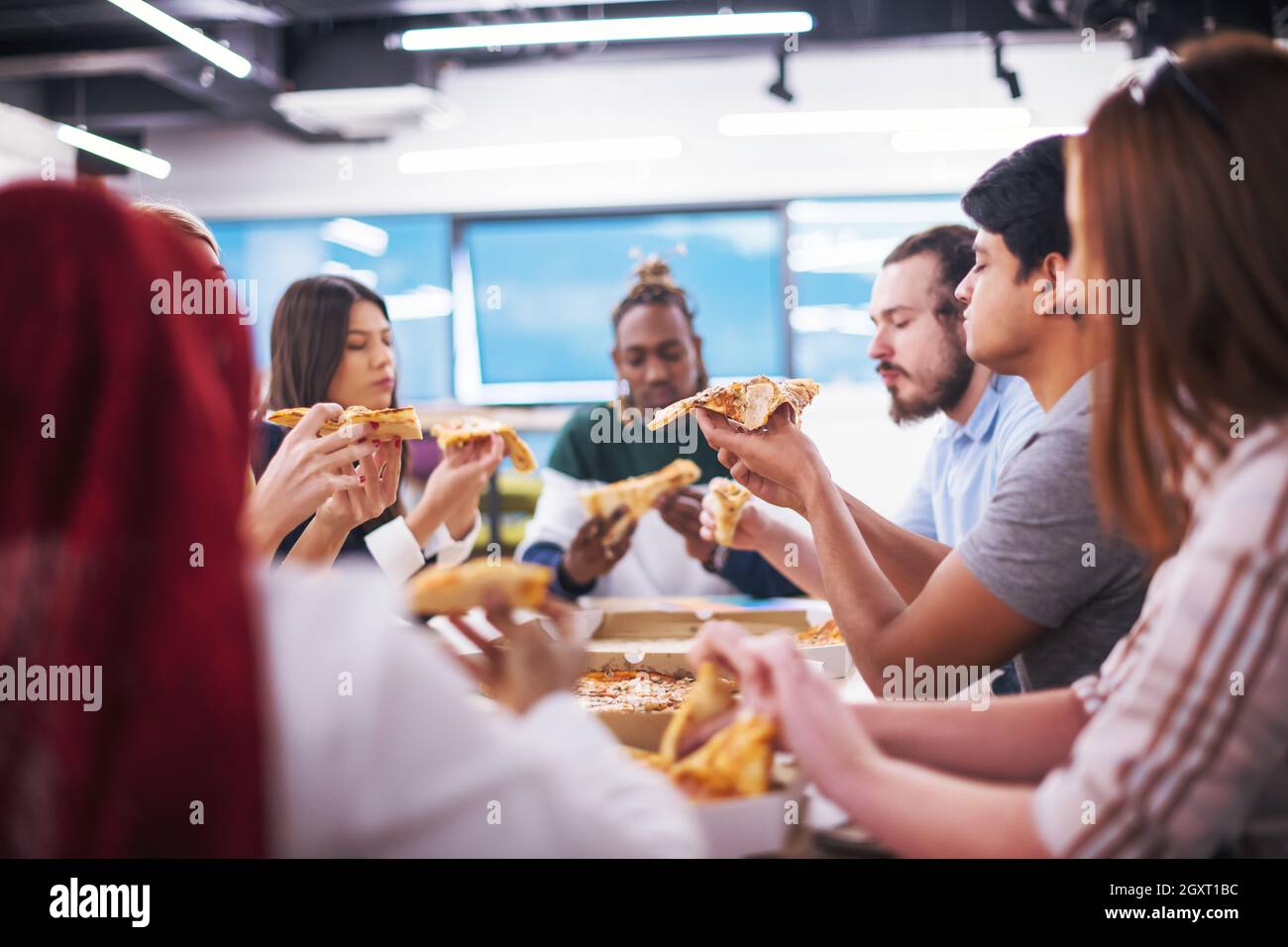 Friendly Diverse Multiethnic Business Team Eating Sharing Pizza
