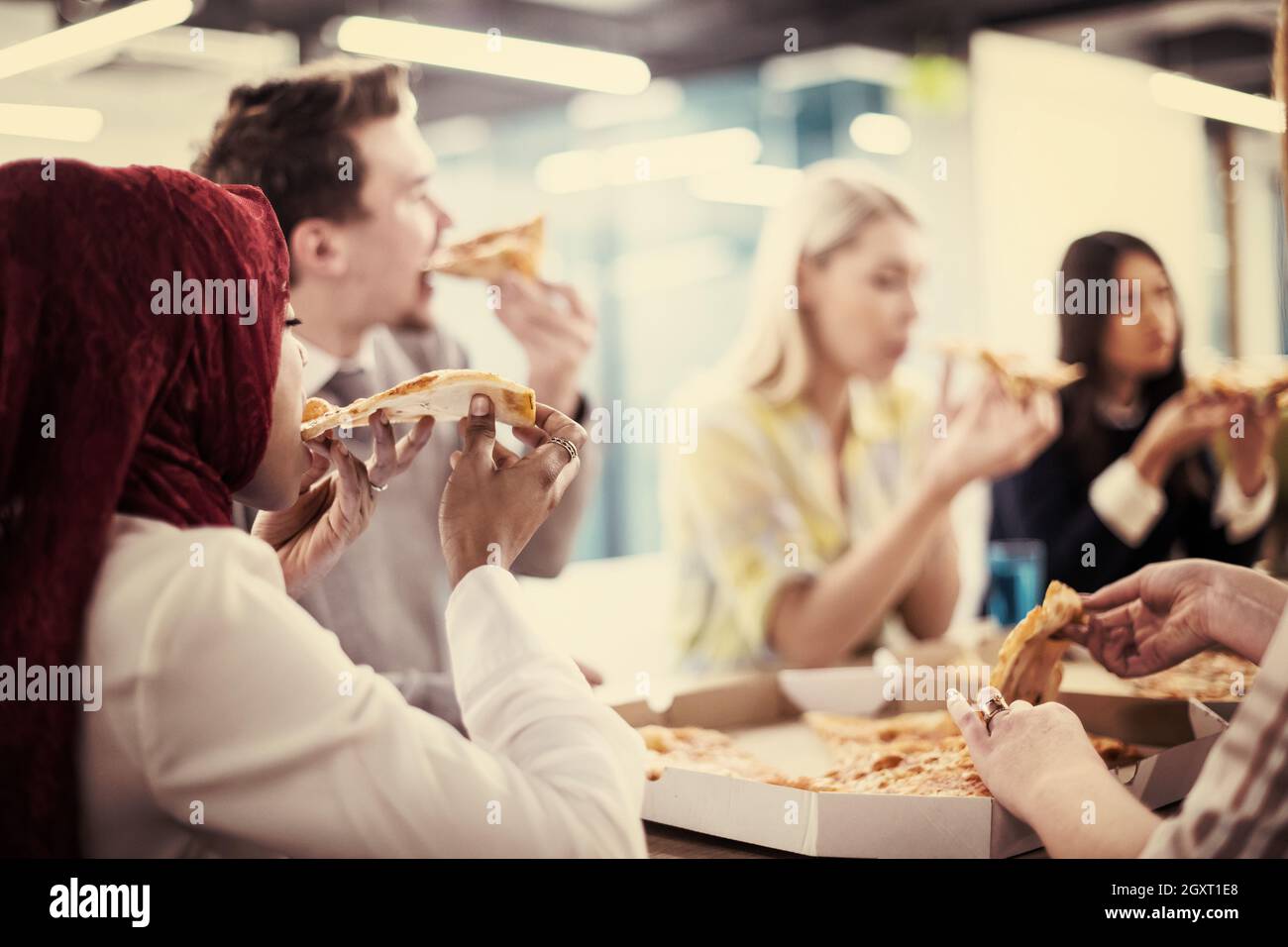 Friendly Diverse Multiethnic Business Team Eating Sharing Pizza