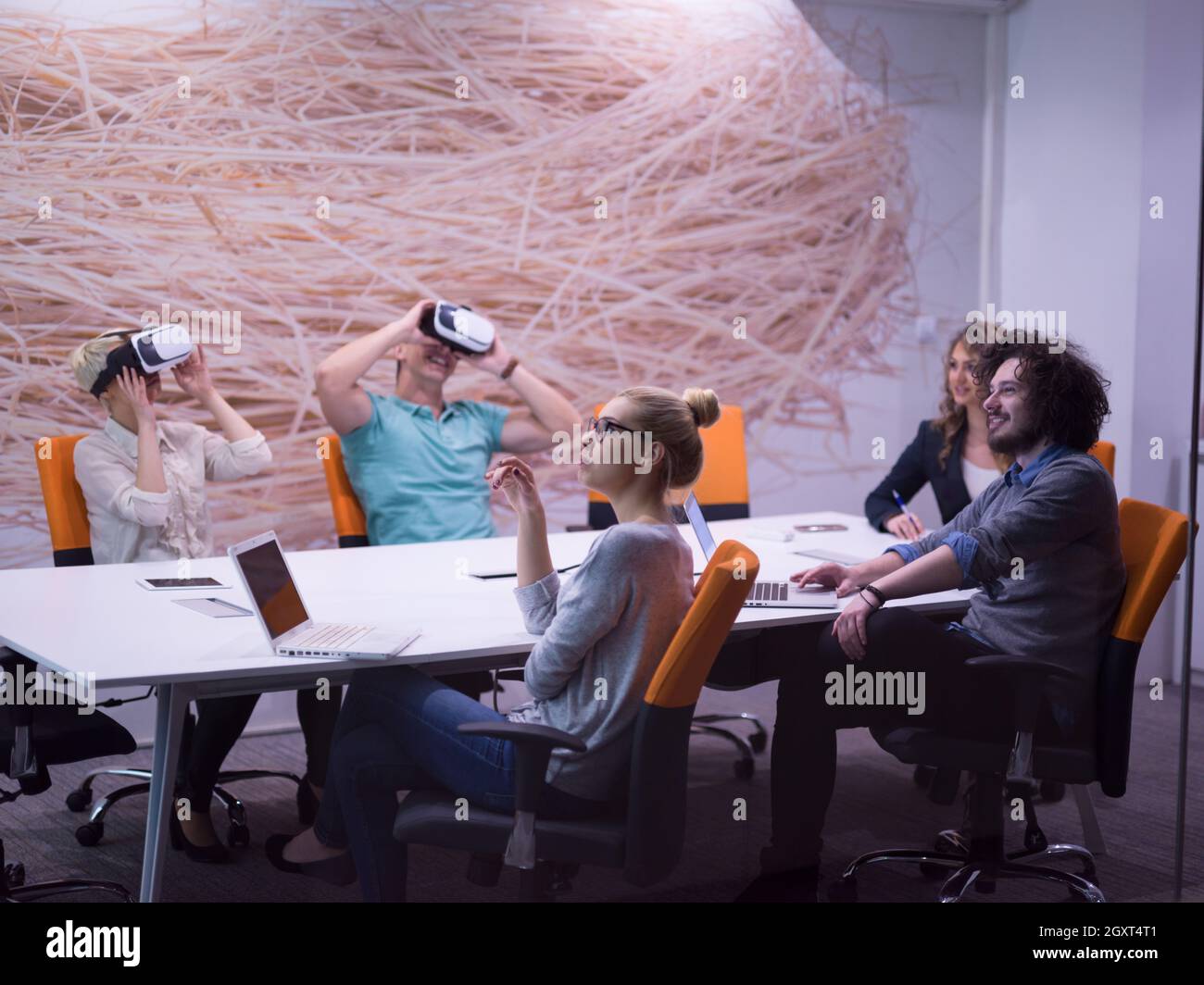 startup Business team using virtual reality headset in night office ...