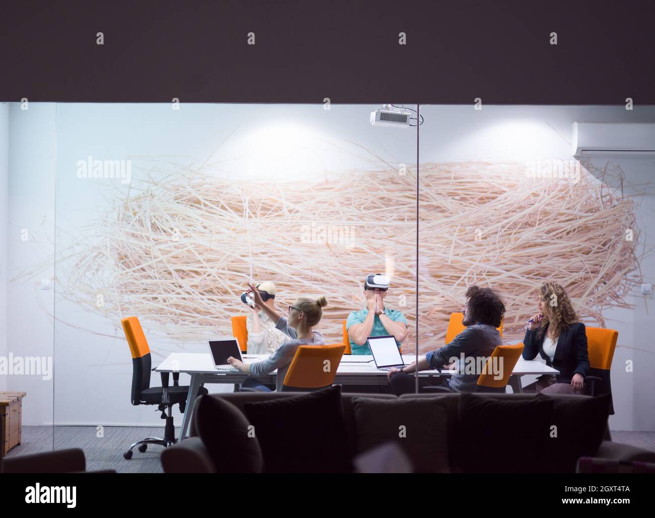 startup Business team using virtual reality headset in night office ...