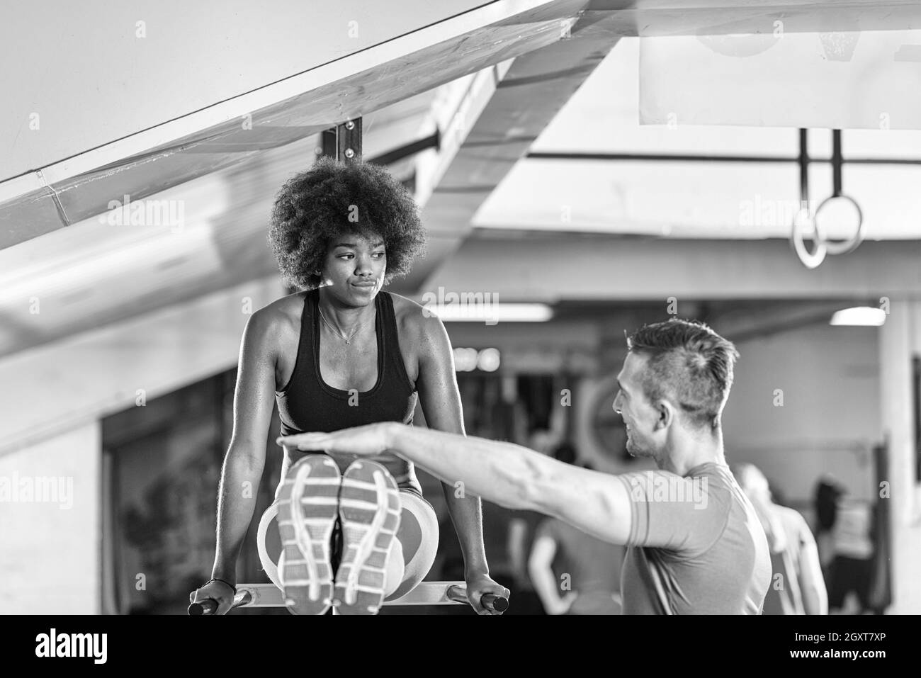 african american athlete woman workout out arms on dips horizontal ...