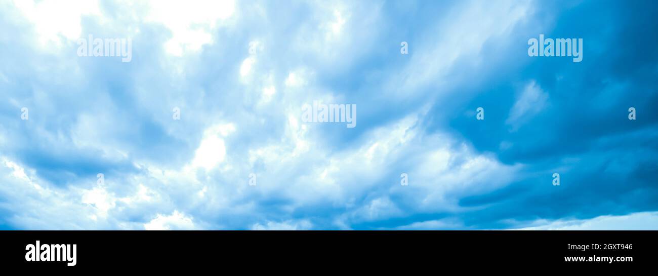 Cyan dramatic sky storm blue cumulus cloud Stock Photo - Alamy