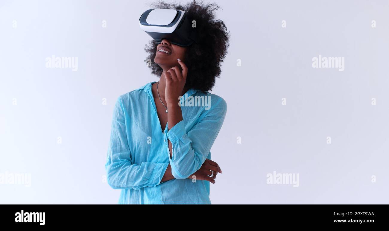 Happy african american girl getting experience using VR headset glasses ...