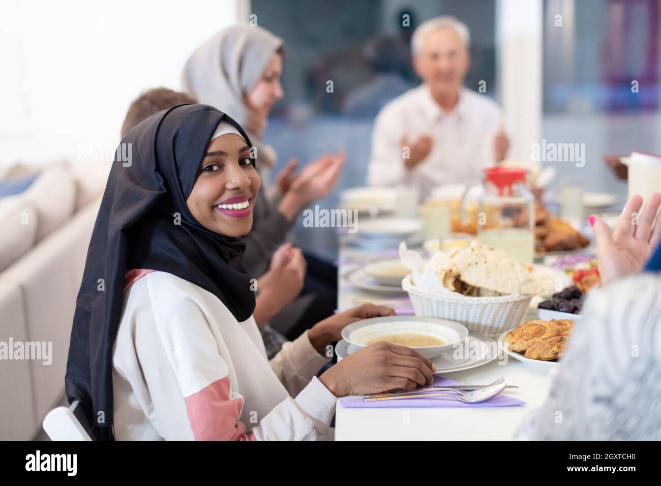 modern african american muslim woman enjoying iftar dinner together ...