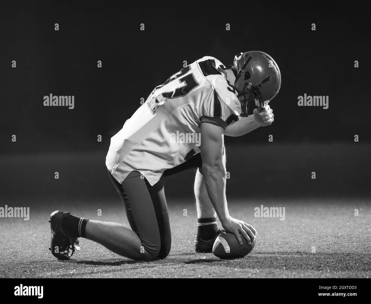 American football player starting football game on american football ...
