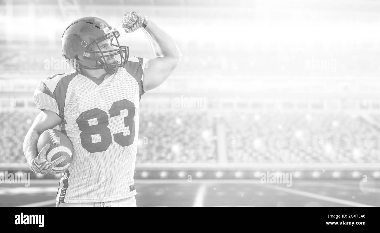 american football player celebrating touchdown on big modern stadium ...