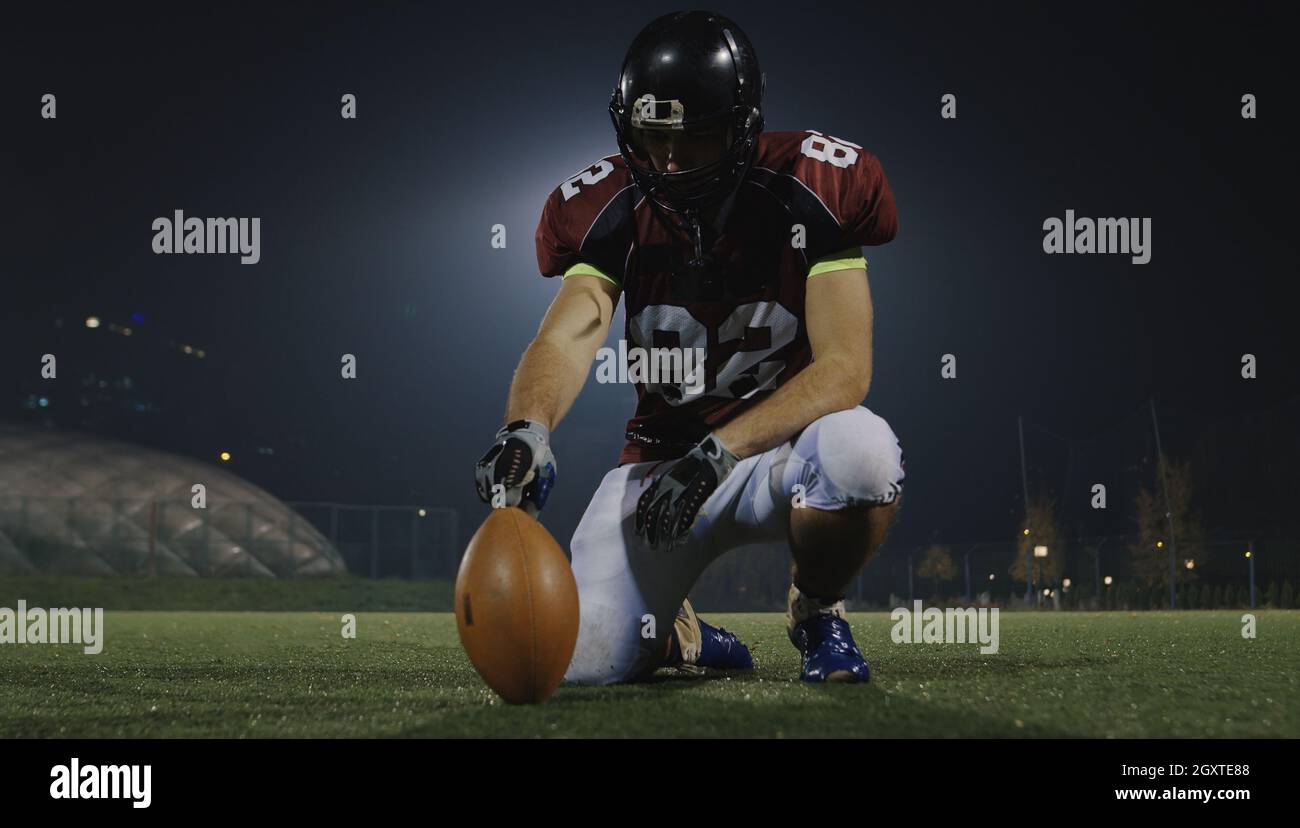 american football kicker ready for football kickoff closeup shot on the ...