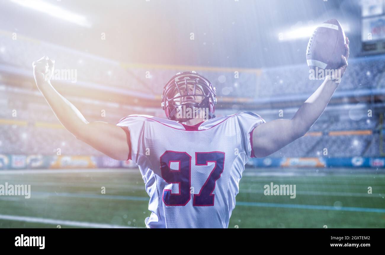 american football player celebrating after scoring a touchdown on big ...