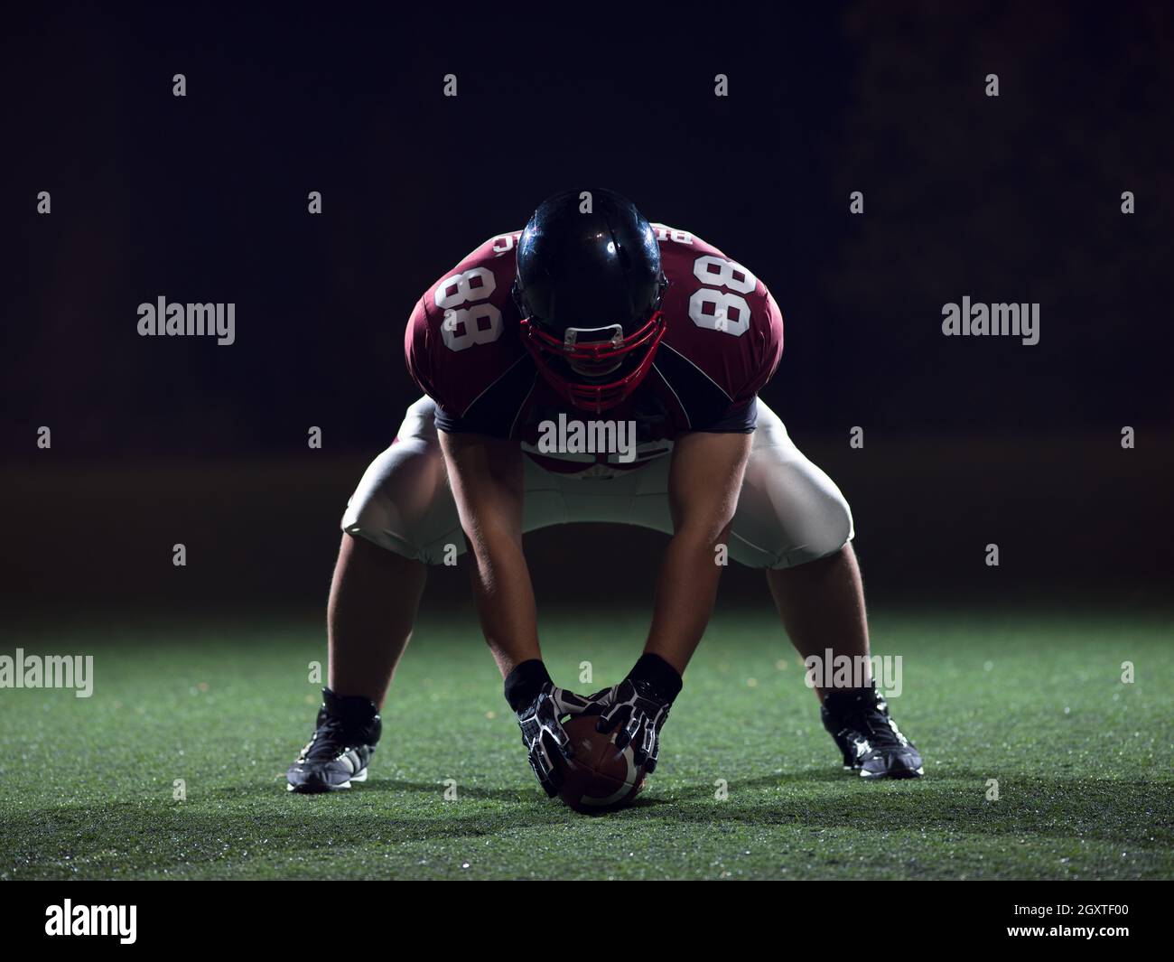 American football player starting football game on american football ...