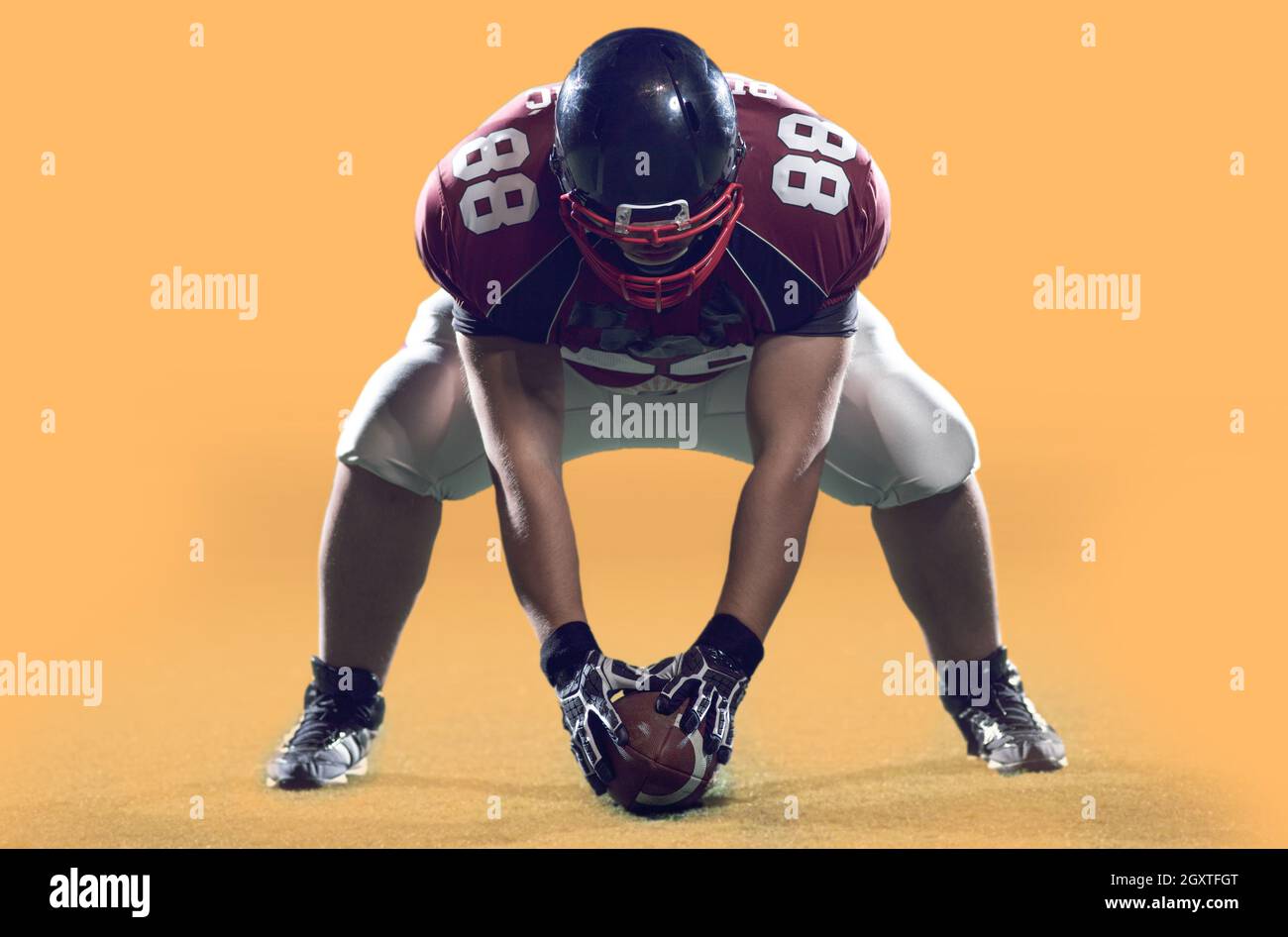 Portrait of a strong muscular American Football Player isolated on ...