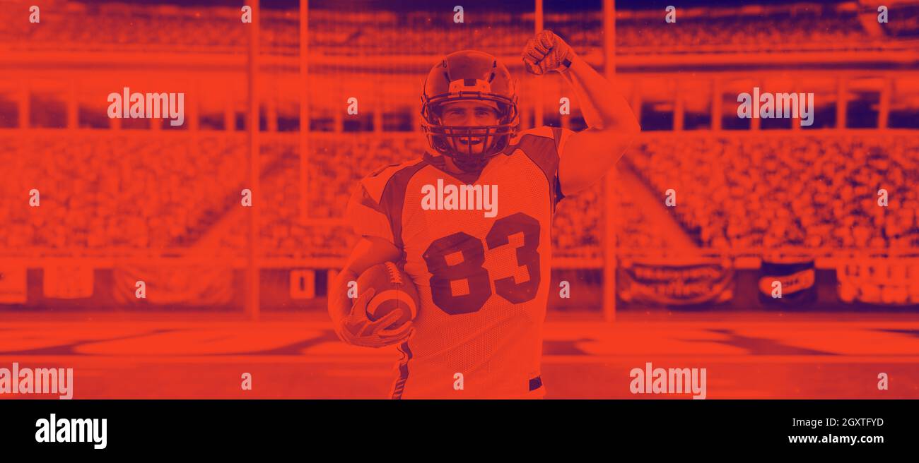 american football player celebrating touchdown on big modern stadium ...