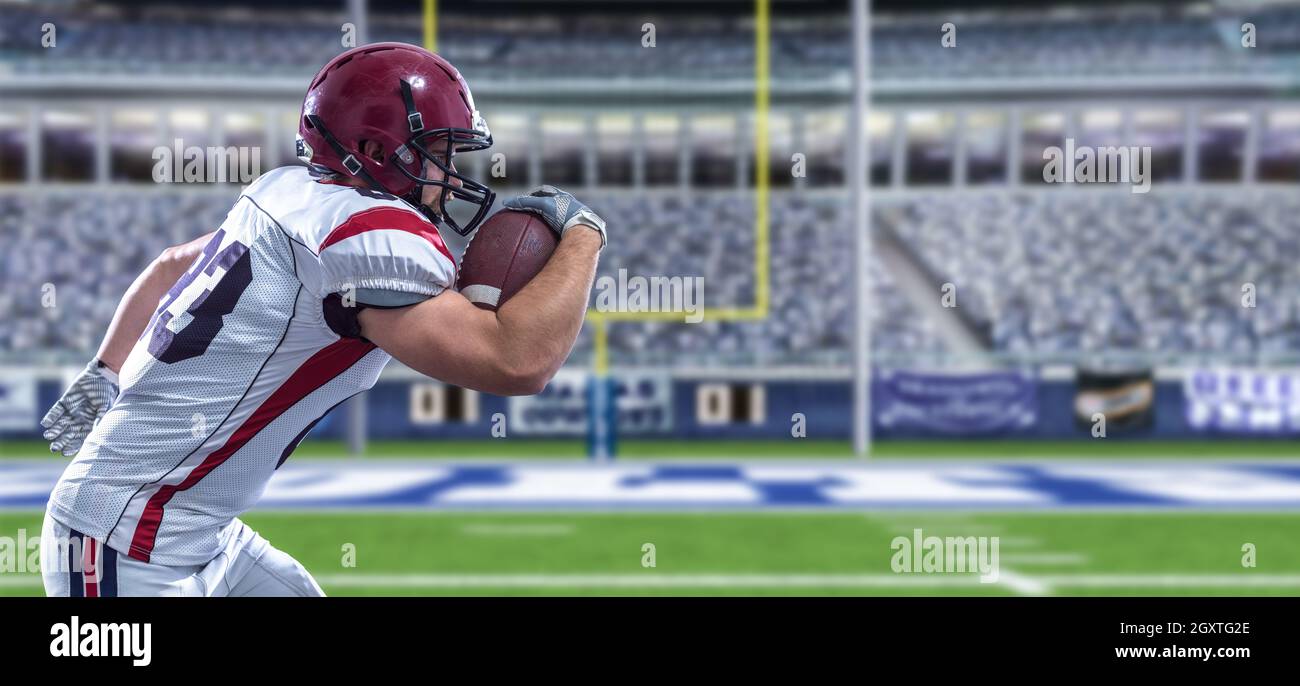 American football Player running with the ball isolated on big modern ...