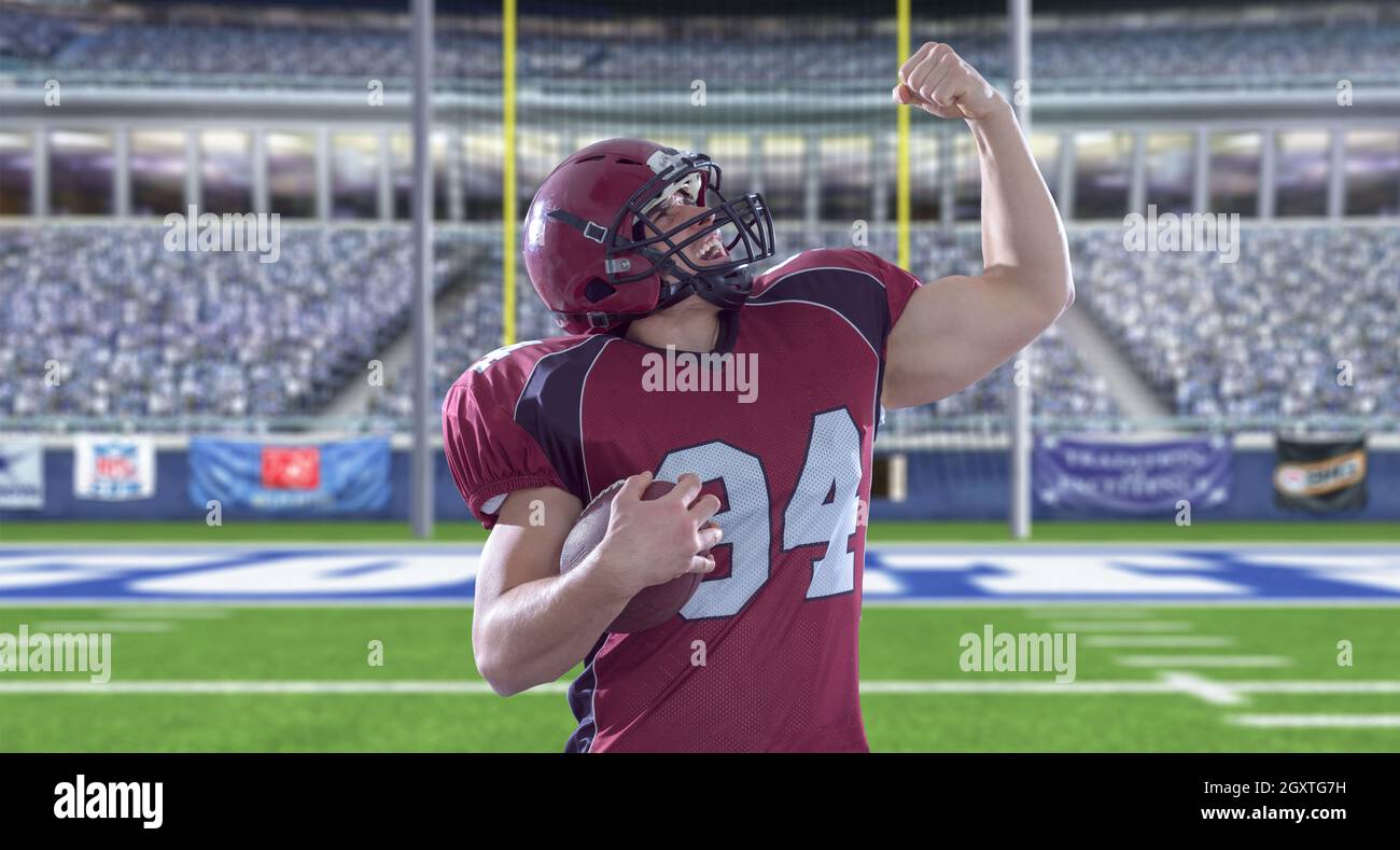 american football player celebrating touchdown on big modern stadium ...