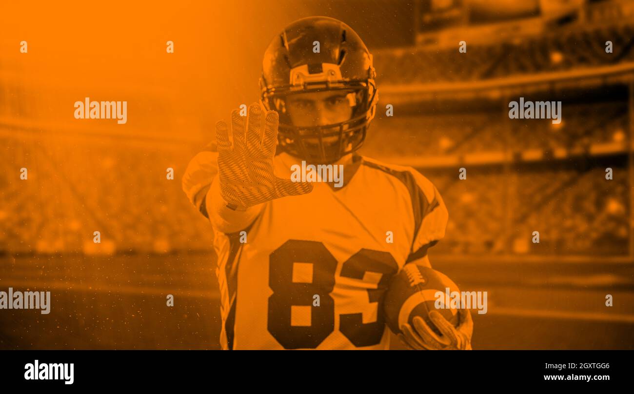 duo toned american football player in arena at night with stadium ...
