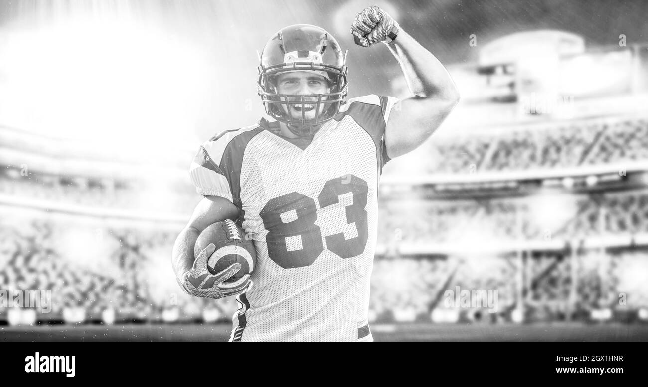 american football player celebrating touchdown on big modern stadium ...