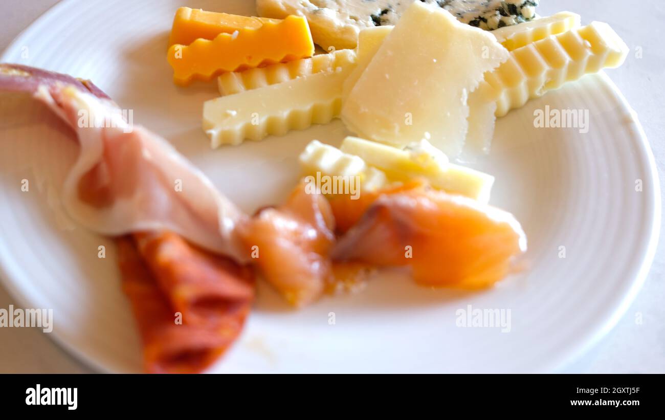 Deli Cheese Plate with Cold Cuts and Fish Stock Photo - Alamy