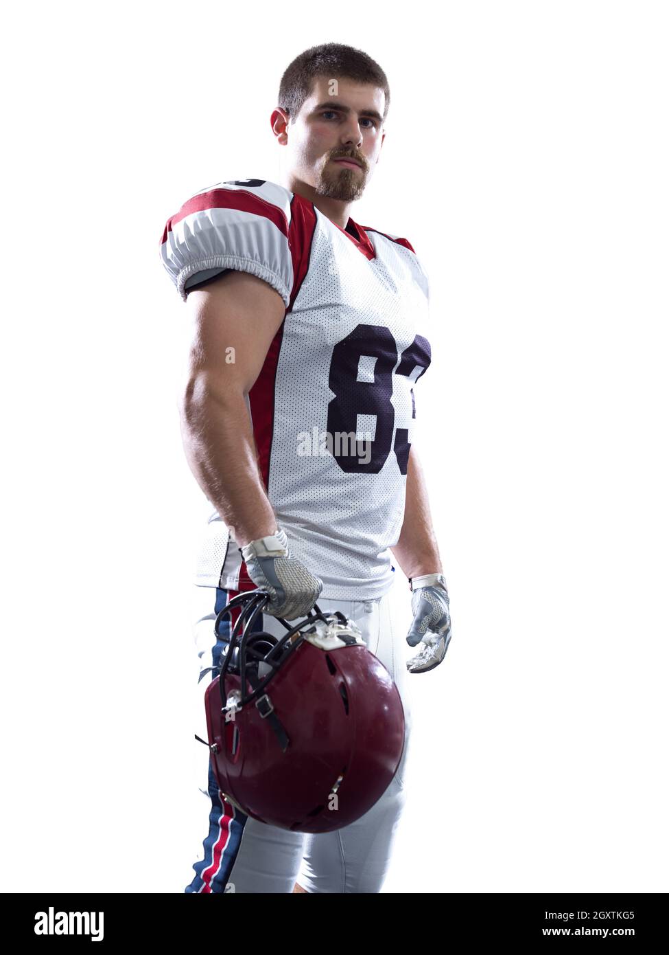 Portrait of a strong muscular American Football Player isolated on ...