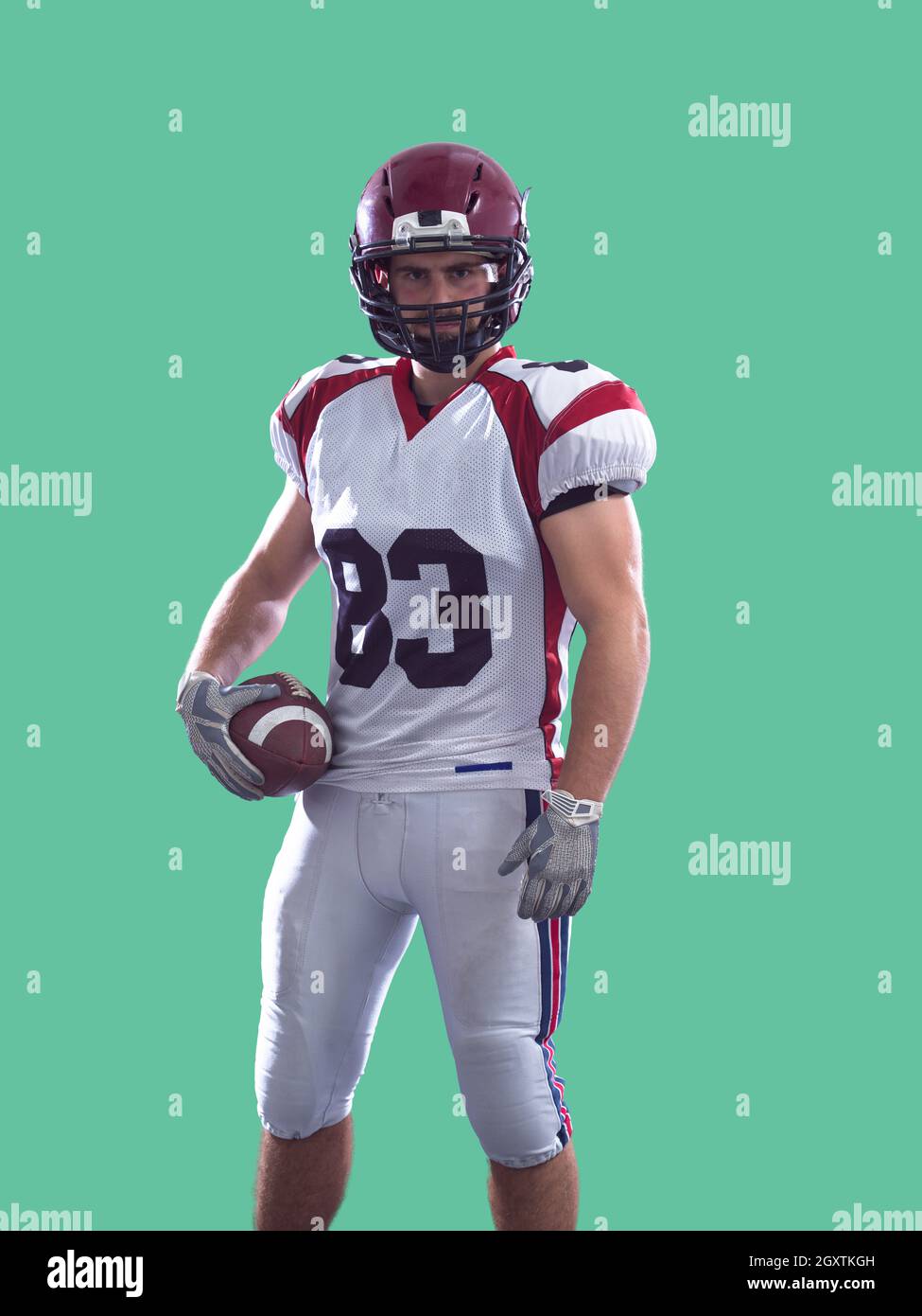 Portrait of a strong muscular American Football Player isolated on ...