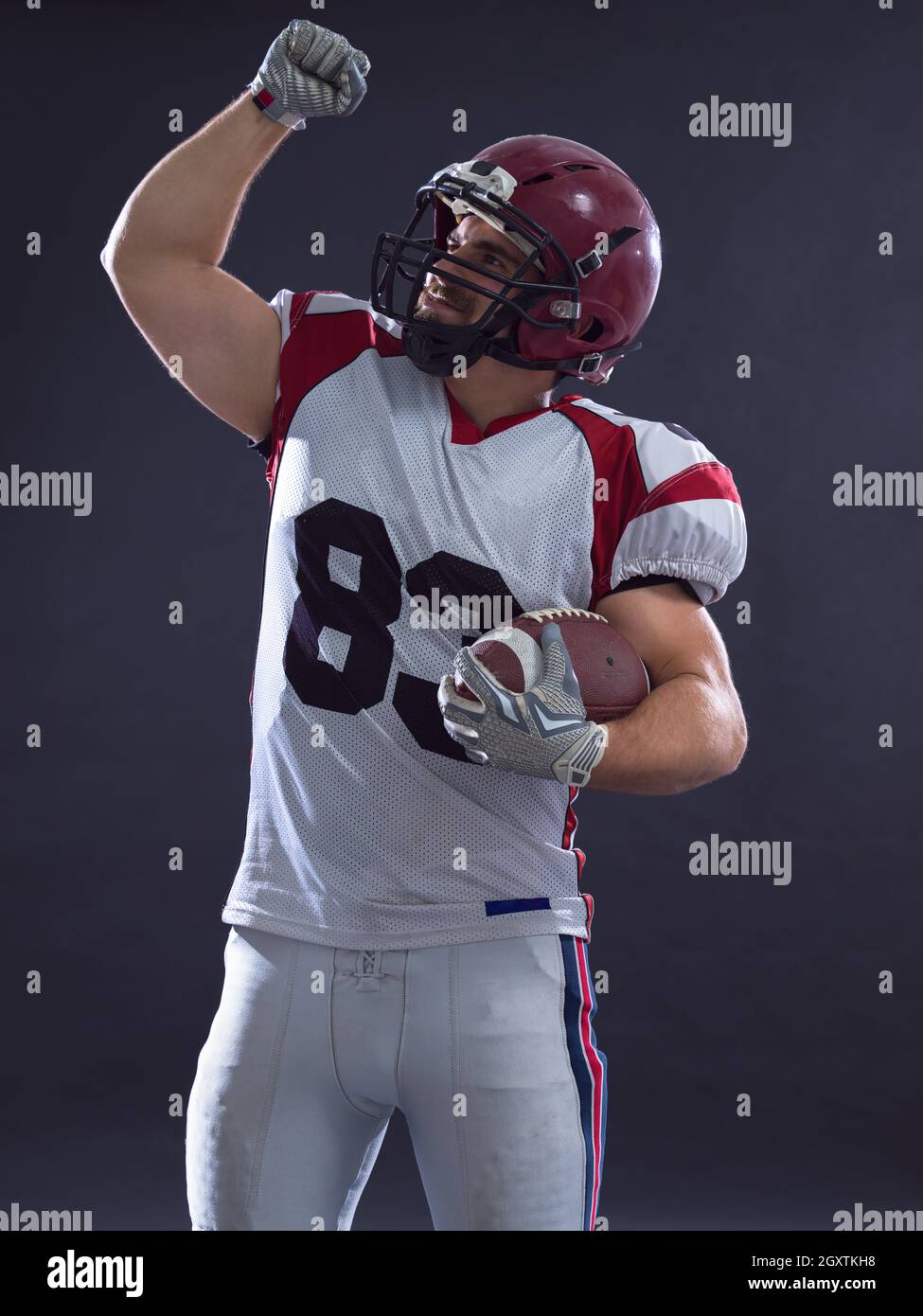 Football action celebrating arms raised hi-res stock photography and ...