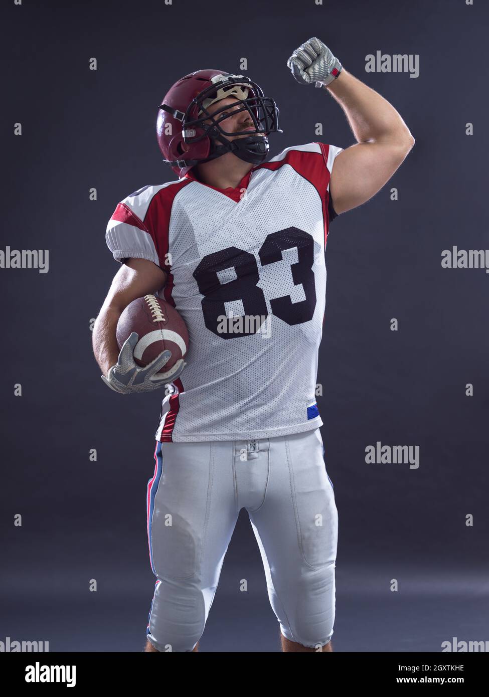 american football player celebrating touchdown isolated on gray ...