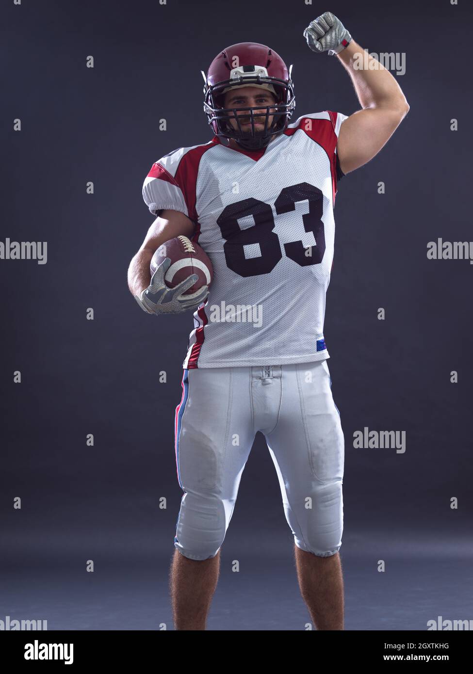 american football player celebrating touchdown isolated on gray ...